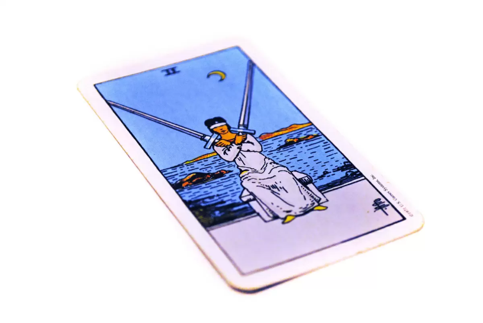 2 de Espadas no Tarot: significado da carta no amor, saúde e mais ...